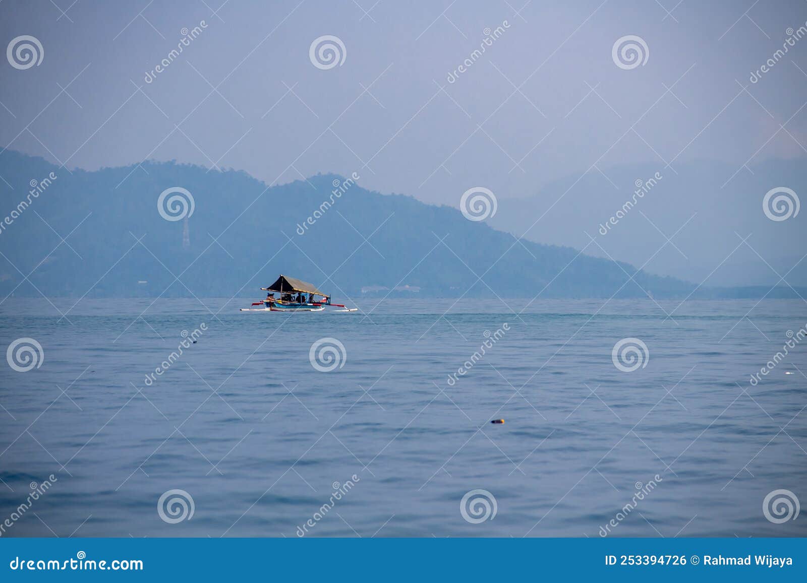 A Fishing Boat in the Middle of the Sea Stock Photo - Image of boating ...