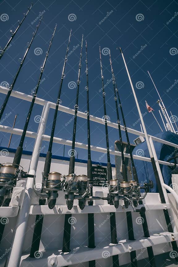 Fishing Boat with Fishing Rods on the Deck Editorial Photo - Image of ...