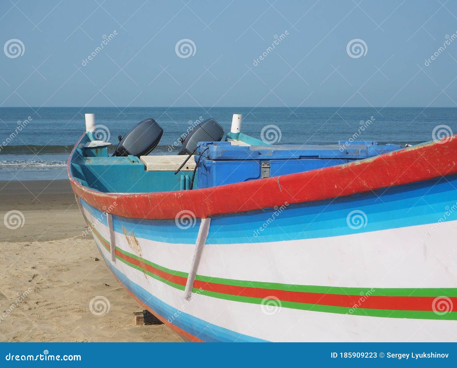 A Fishing Boat Stands on the Beach during the Day Stock Image - Image ...