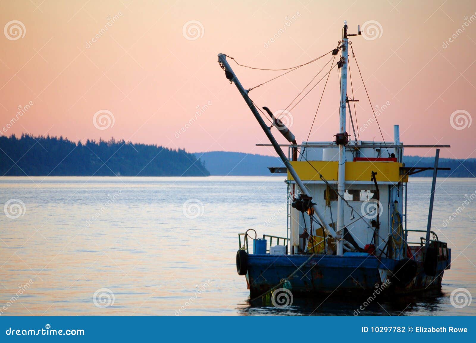 Fishing Boat at Sunset stock photo. Image of trees, boat - 10297782