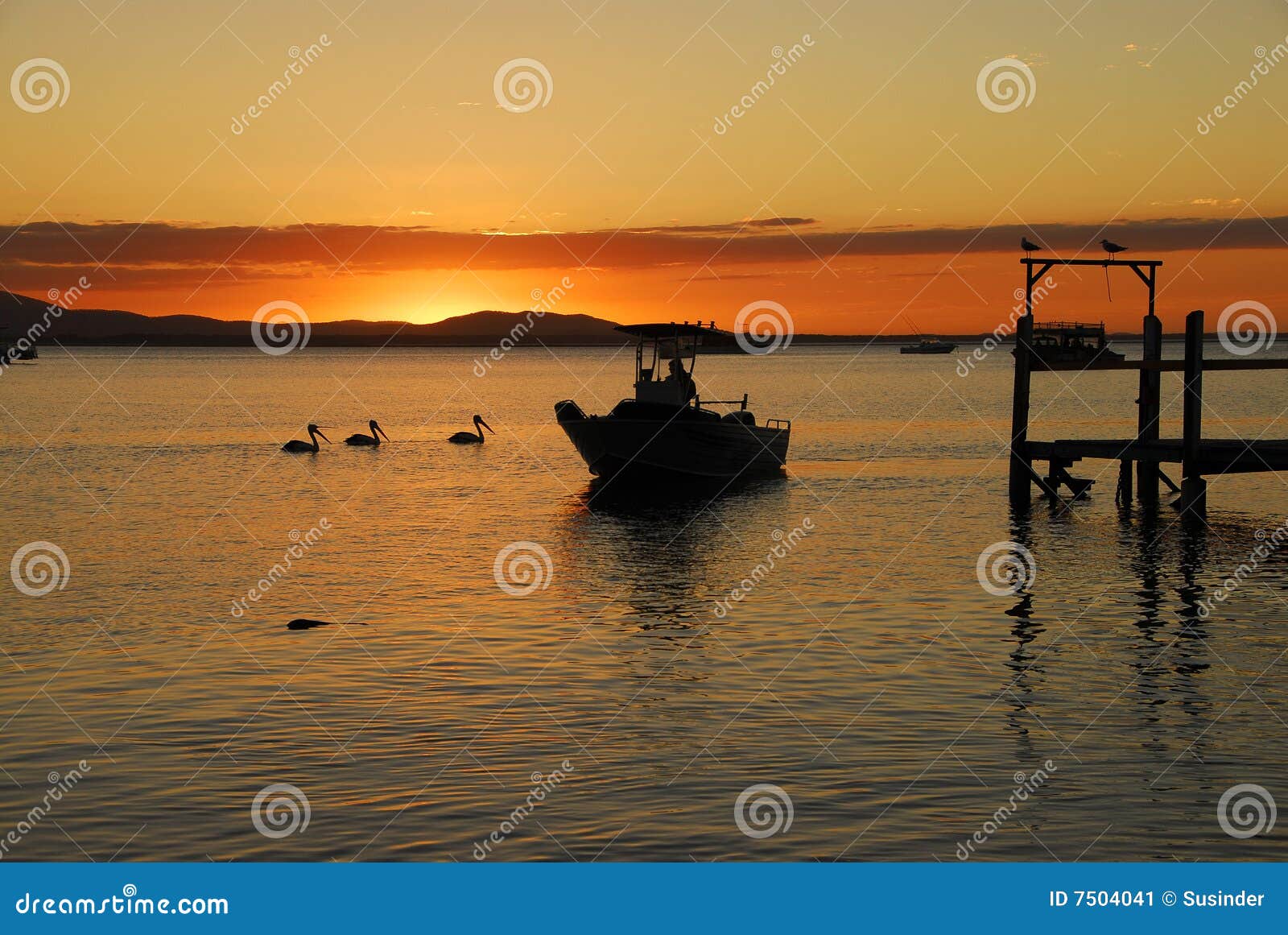 Fishing boat at sunset stock image. Image of cloudscape - 7504041
