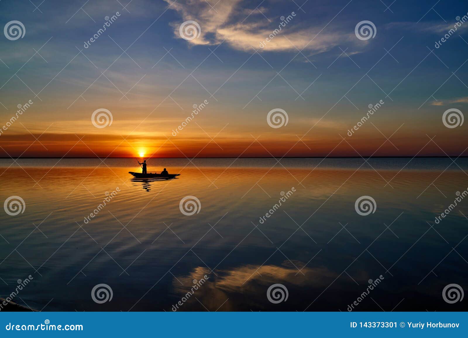 Fishing boat at sunset stock image. Image of ocean, coast - 143373301