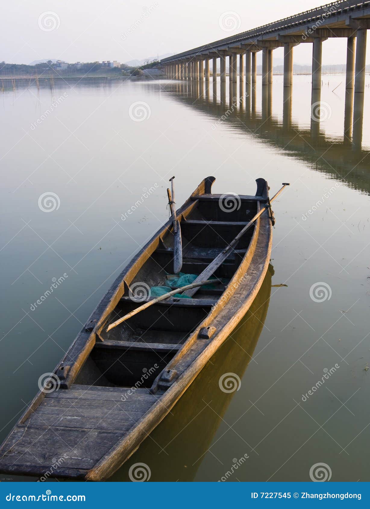 Fishing Boat Under a Bridge Stock Image - Image of bridge, area: 7227545