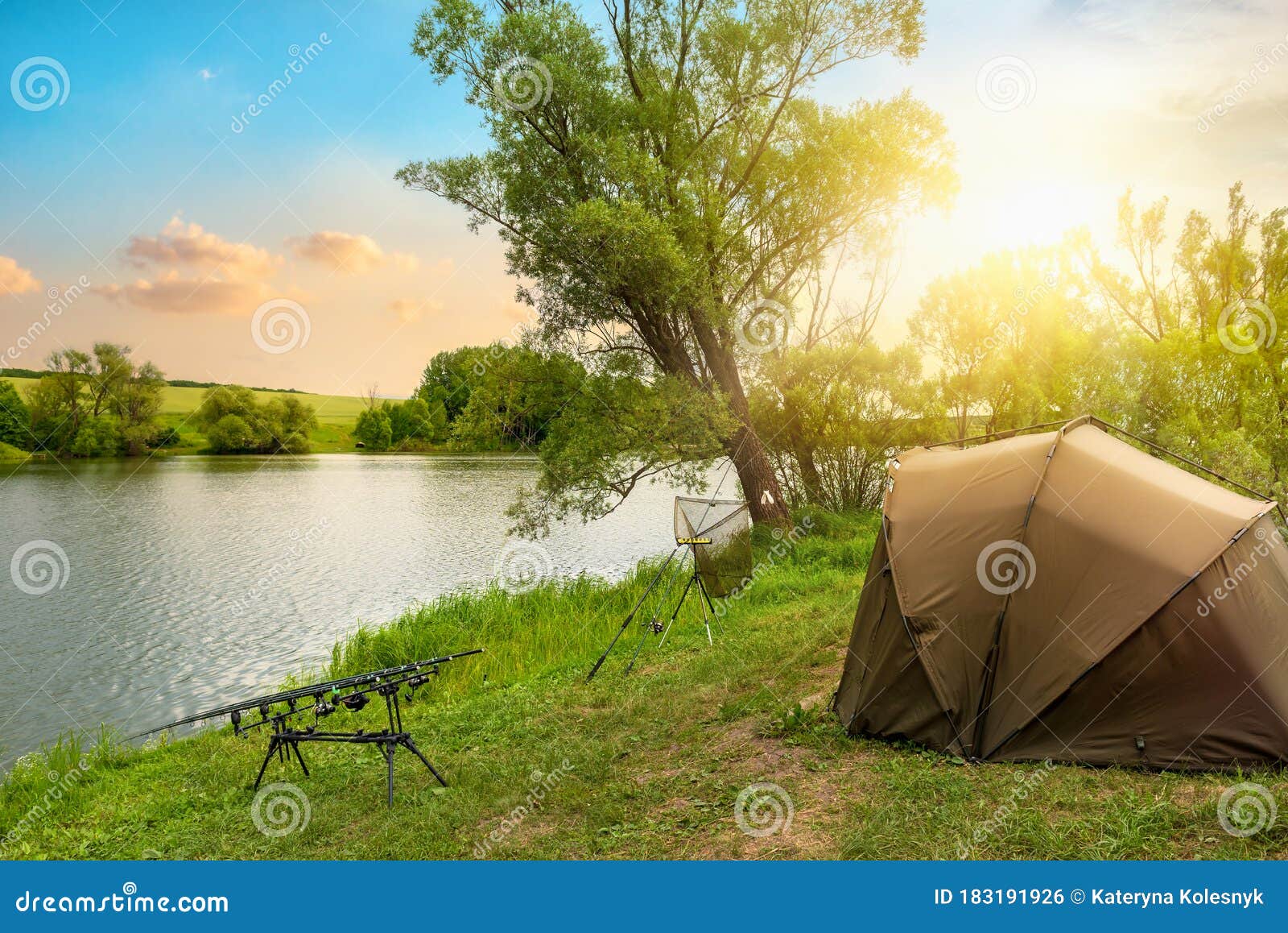 Fishing camp at sunset stock photo. Image of fishing - 183191926