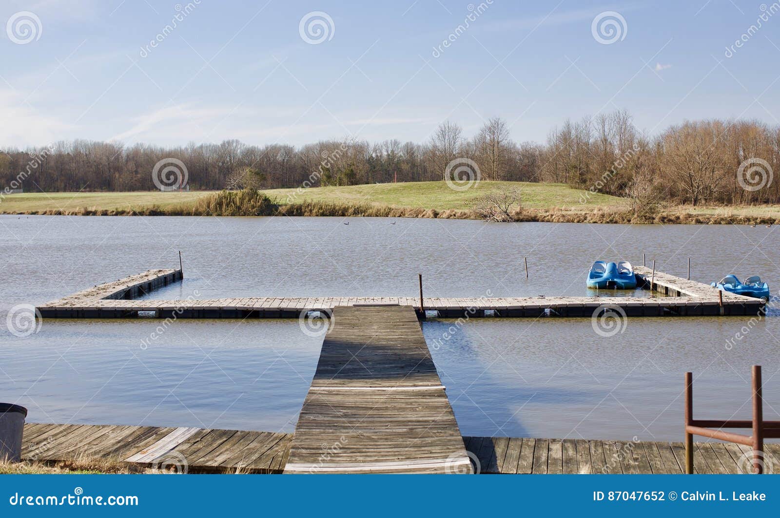 Fishing Dock at a Lake stock photo. Image of calm, people - 87047652