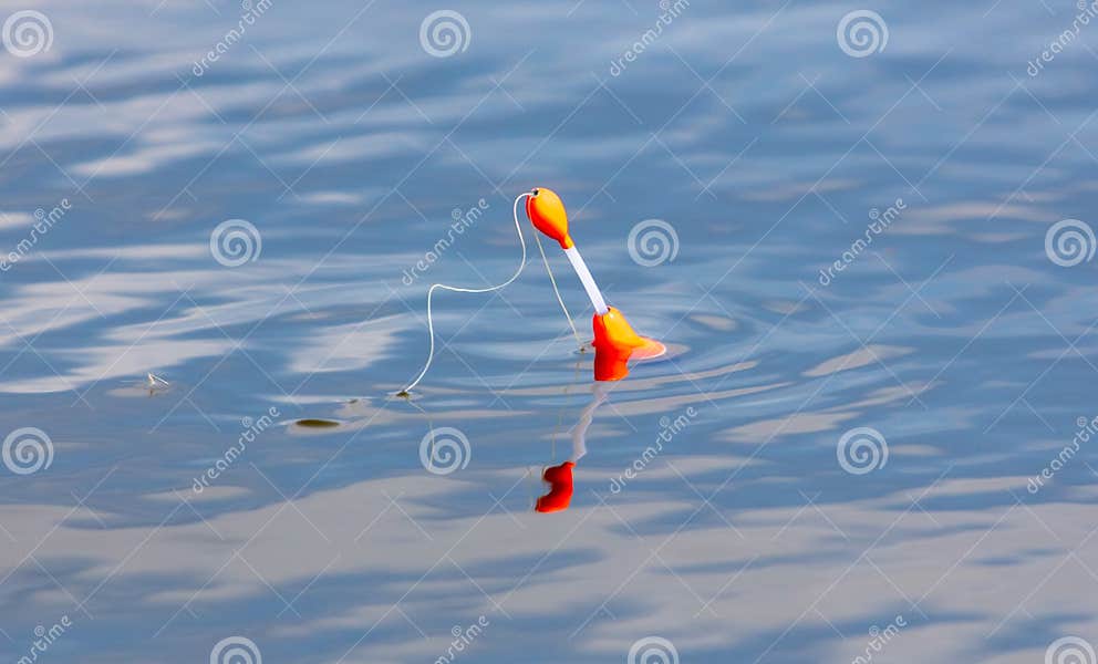A Fishing Float Floats on the Waves Stock Image - Image of waves, beach ...