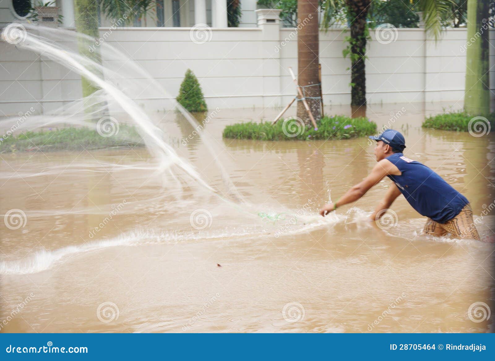 Fishing in the flood editorial stock image. Image of jakarta - 28705464