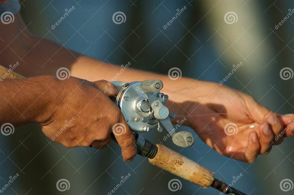 Fishing Hands stock photo. Image of angling, finger, reel - 34728