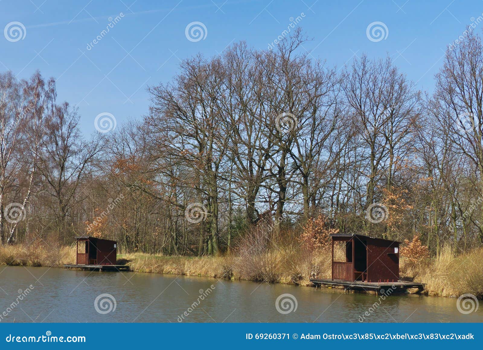 Fishing huts stock image. Image of trees, fish, fisherman - 69260371