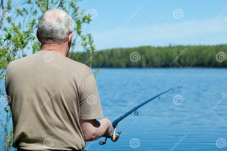 Fishing man with a rod stock image. Image of casting - 25645643