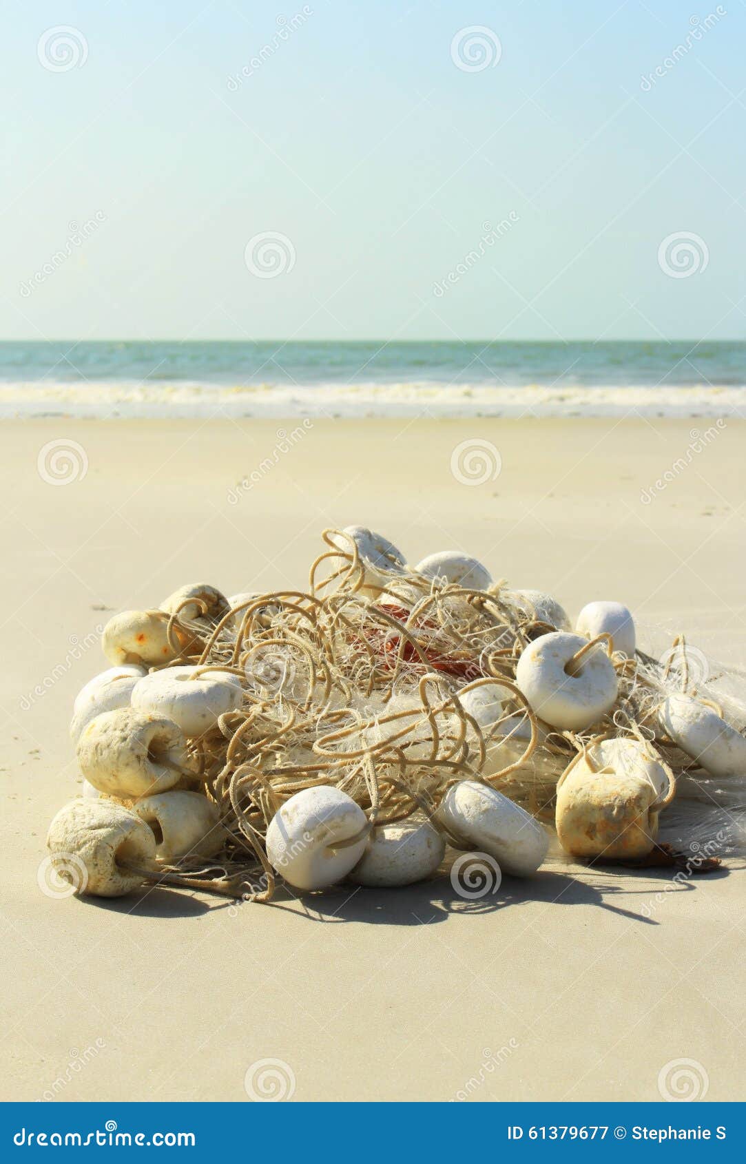 Fishing net by the beach stock image. Image of fishing - 61379677