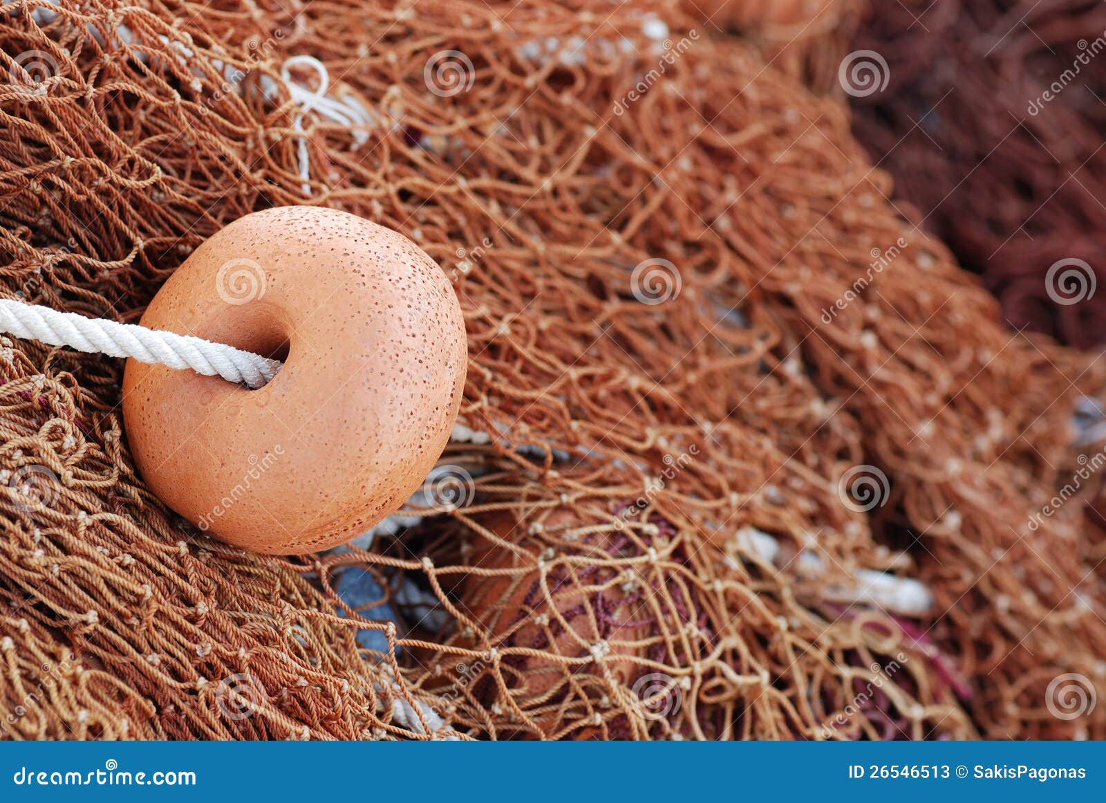 Fishing Net with Brown Floats Stock Image - Image of water, nylon: 26546513
