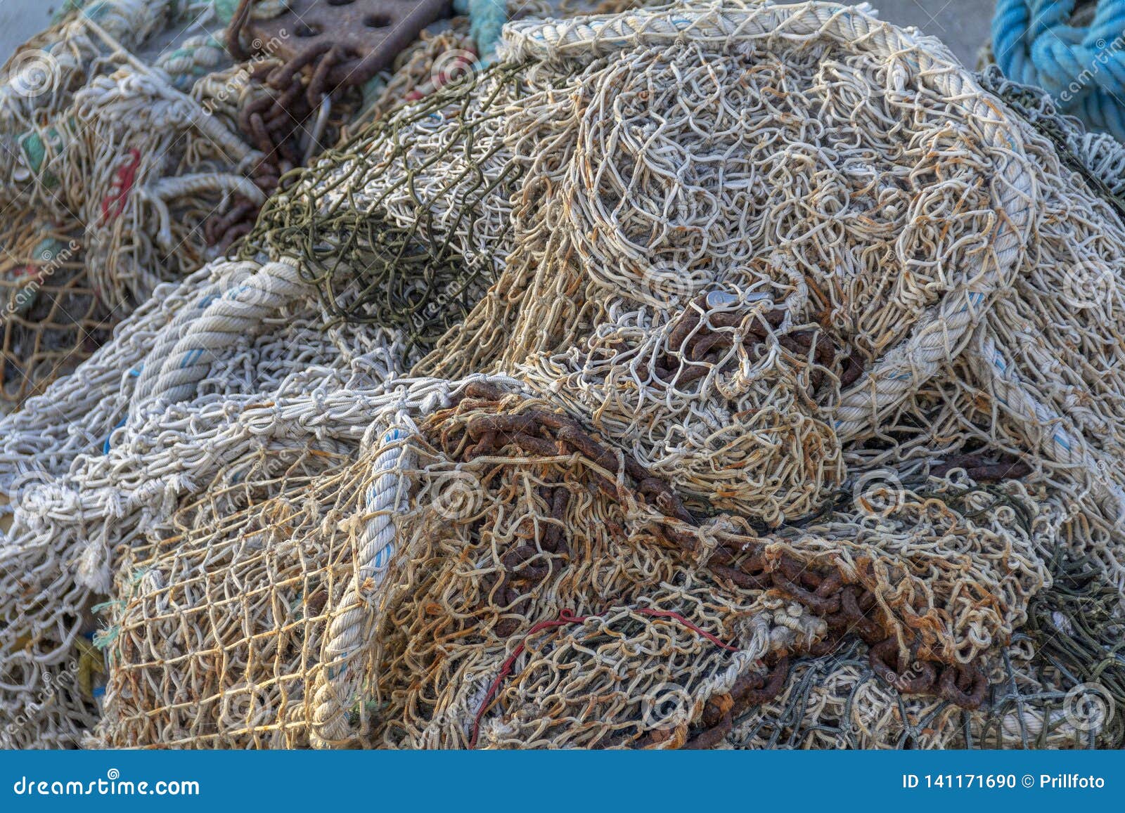 Fishing net entanglement stock photo. Image of textile - 141171690