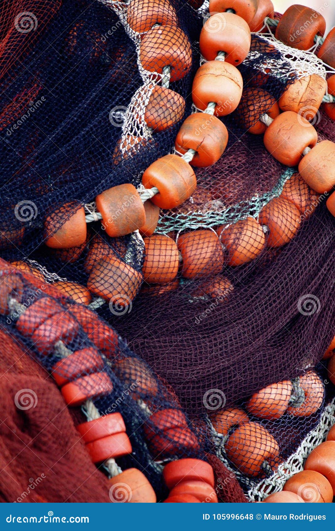 Fishing net and floaters stock photo. Image of tangle - 105996648