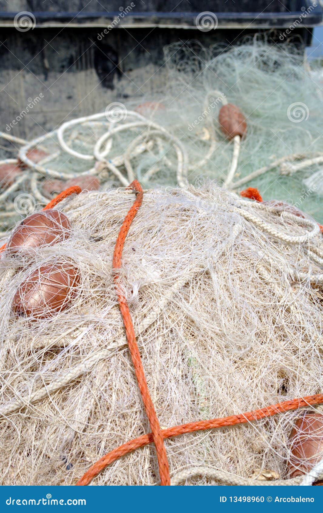 Fishing net and floats stock photo. Image of equipment - 13498960