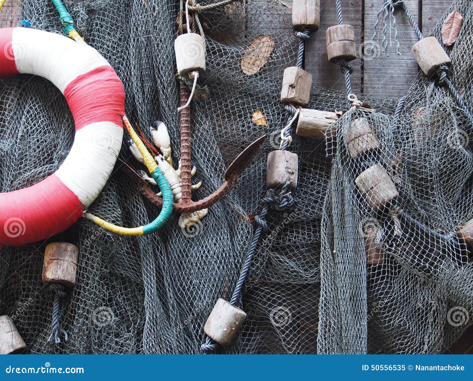 Fishing Net is Hanging on the Wooden Wall Stock Image - Image of ...