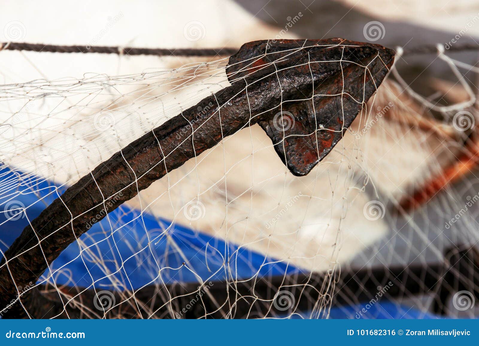 Fishing net and the anchor stock photo. Image of closeup - 101682316
