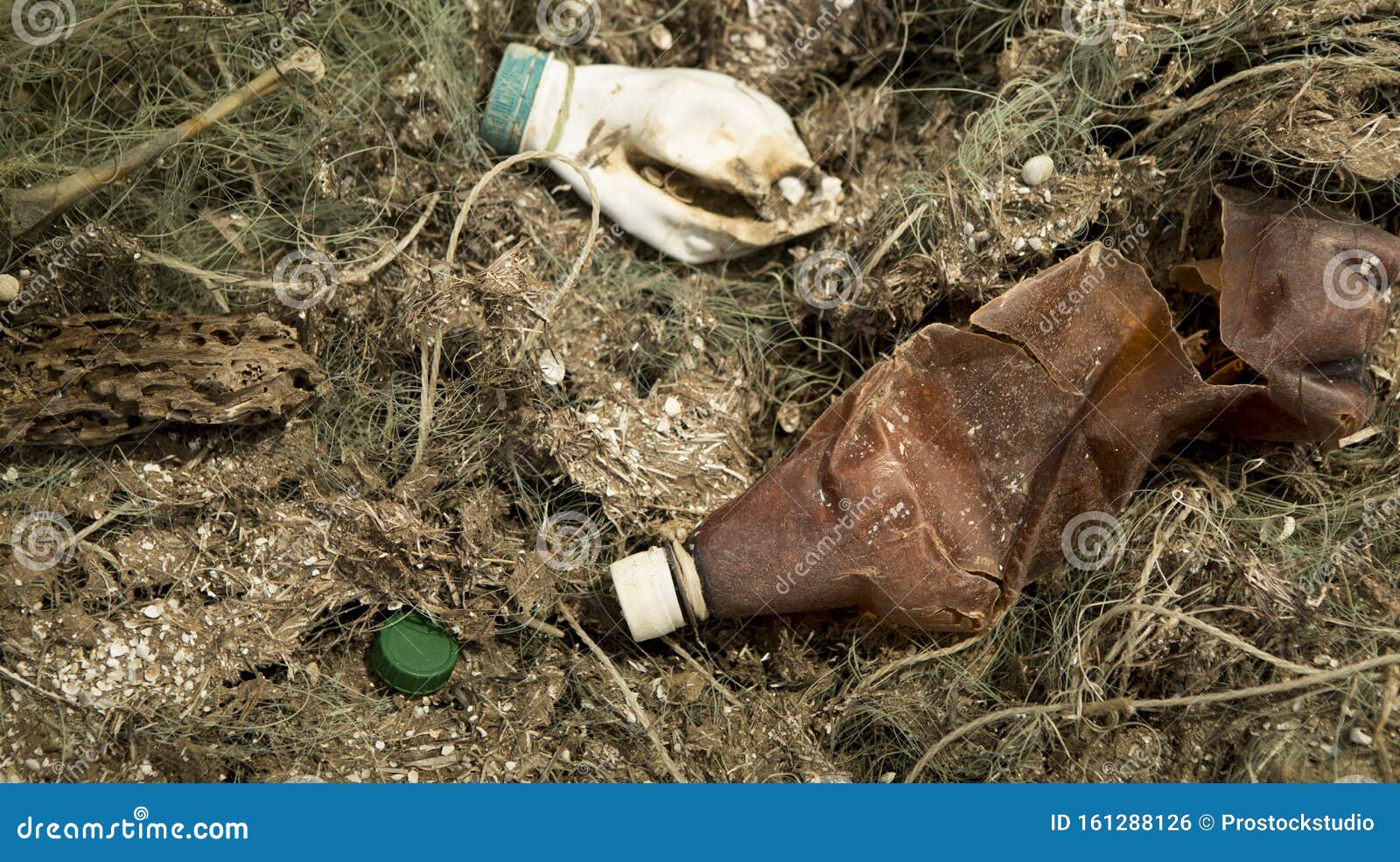 Fishing Net with Plastic Garbage and Trash on Beach Stock Photo - Image ...