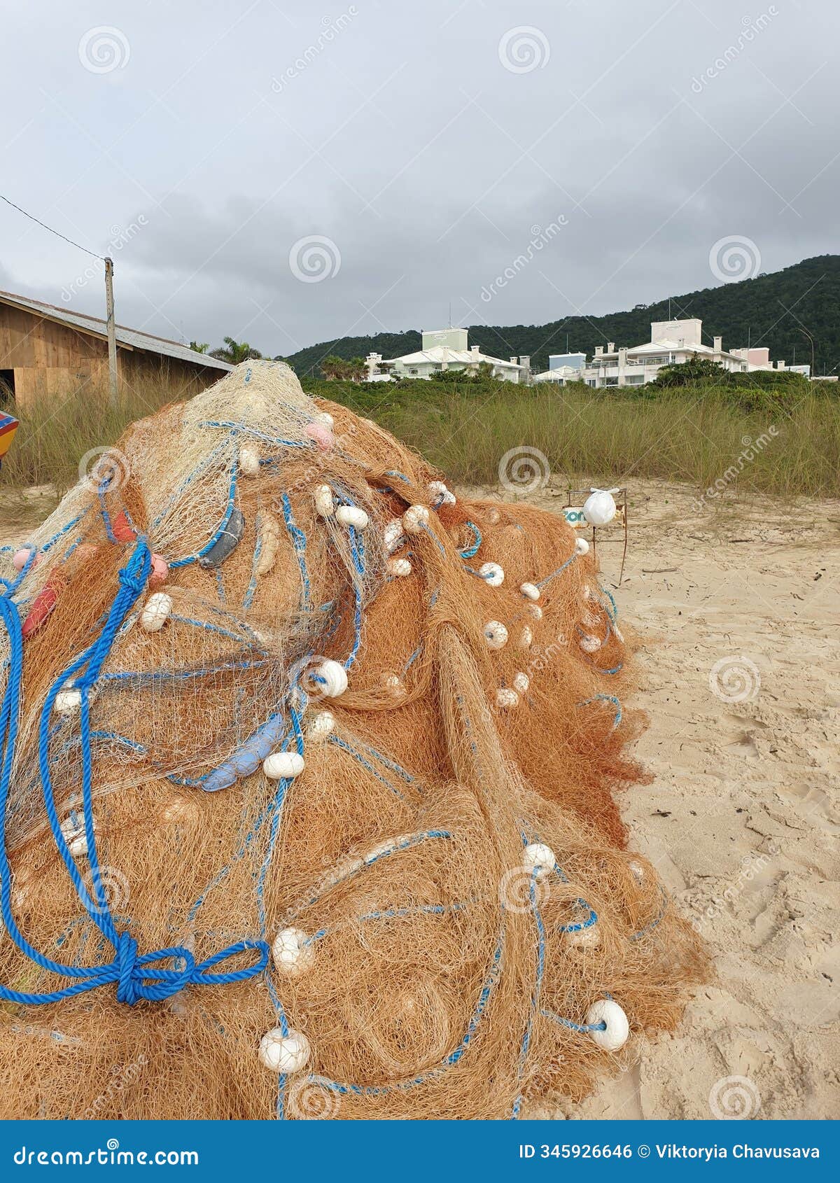 Fishing nets on the beach stock photo. Image of geology - 345926646