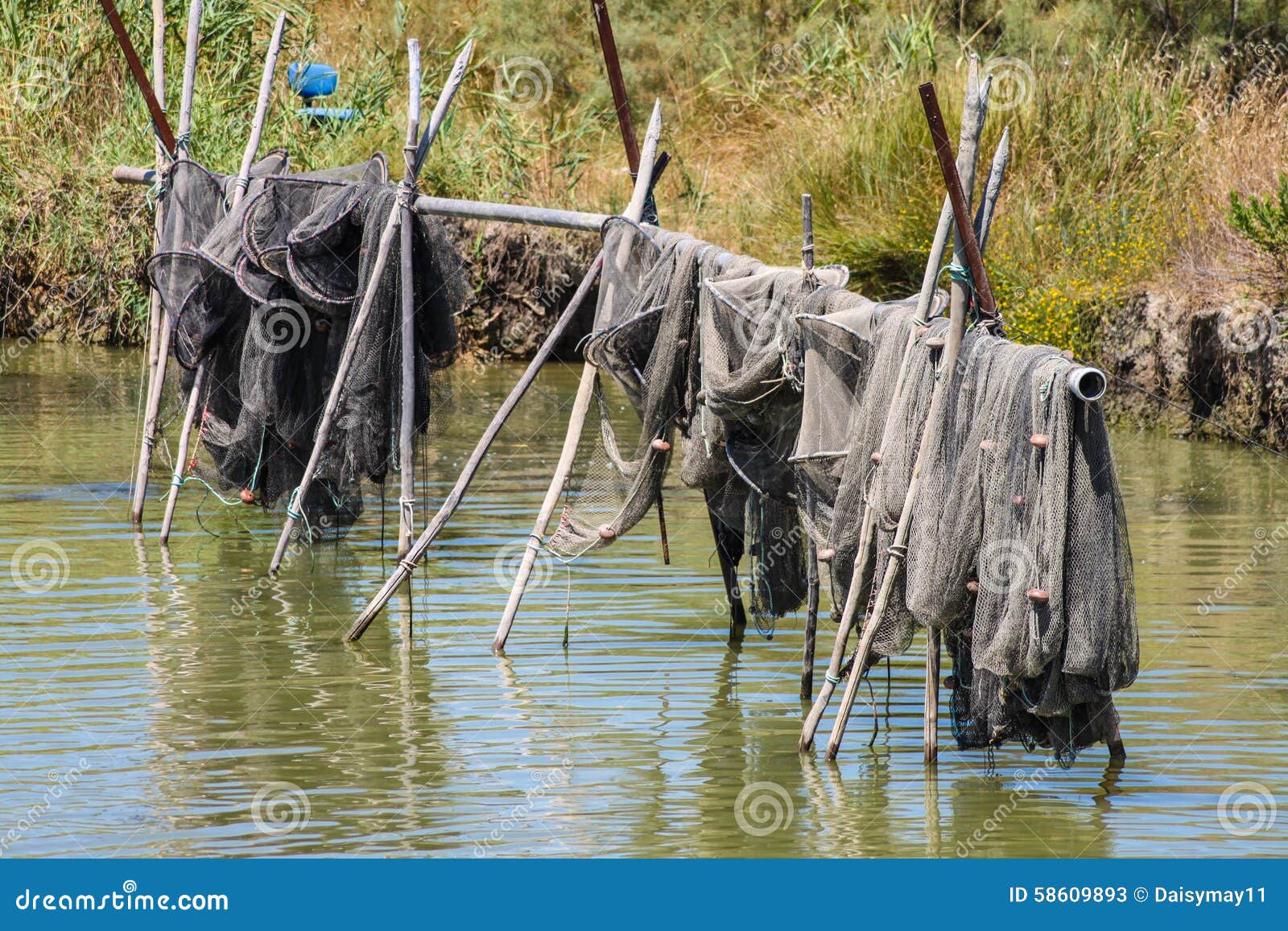 Fishing nets stock image. Image of languestoc, nets, river - 58609893