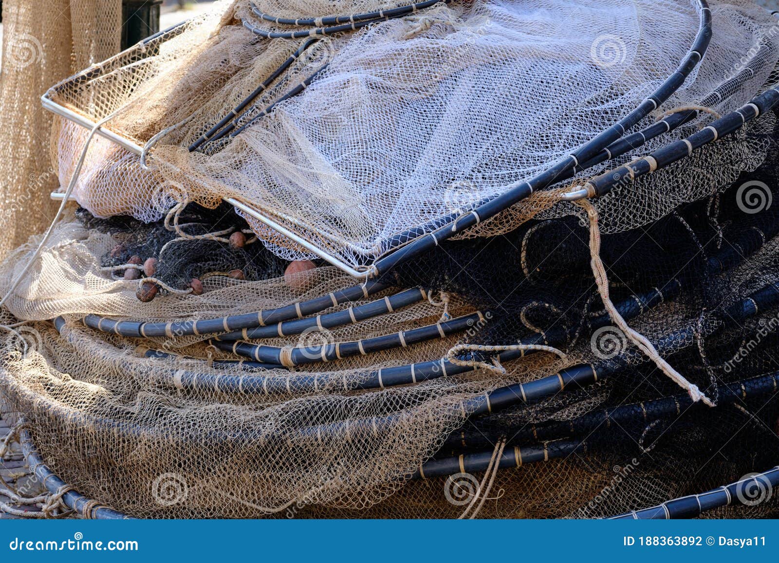 Fishing Nets Stored in Bundles, Stacked Outdoors on the Floor Stock ...