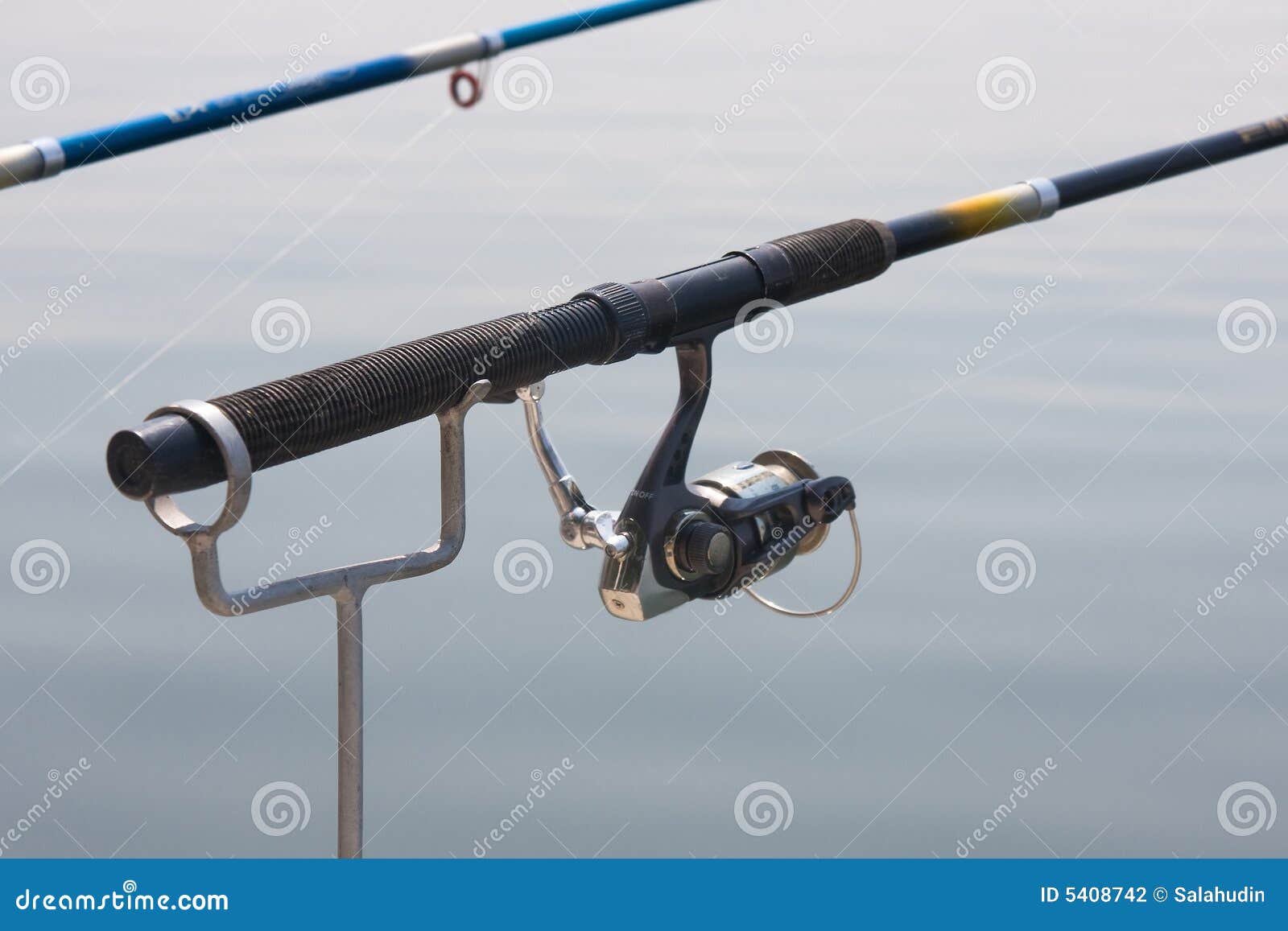 Fishing pole stock photo. Image of water, lure, hook, bait - 5408742