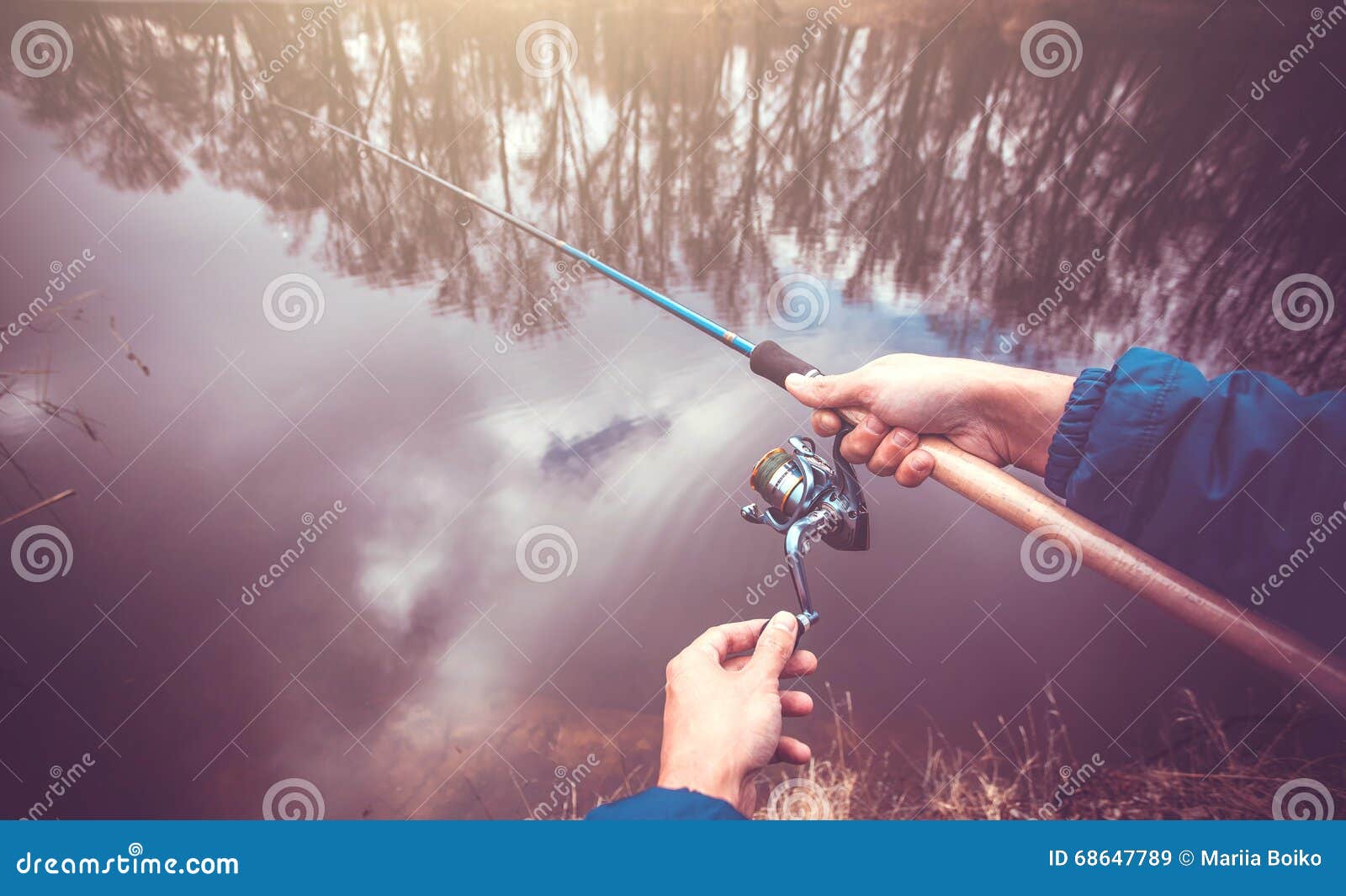 Fishing Rod in Hands of a Fisherman Stock Image - Image of enjoyment ...