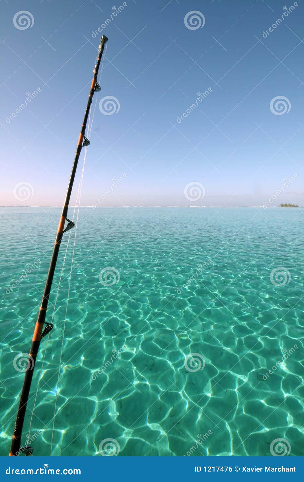 Fishing Rod Over Blue Lagoon Stock Photo - Image of color, bottom: 1217476