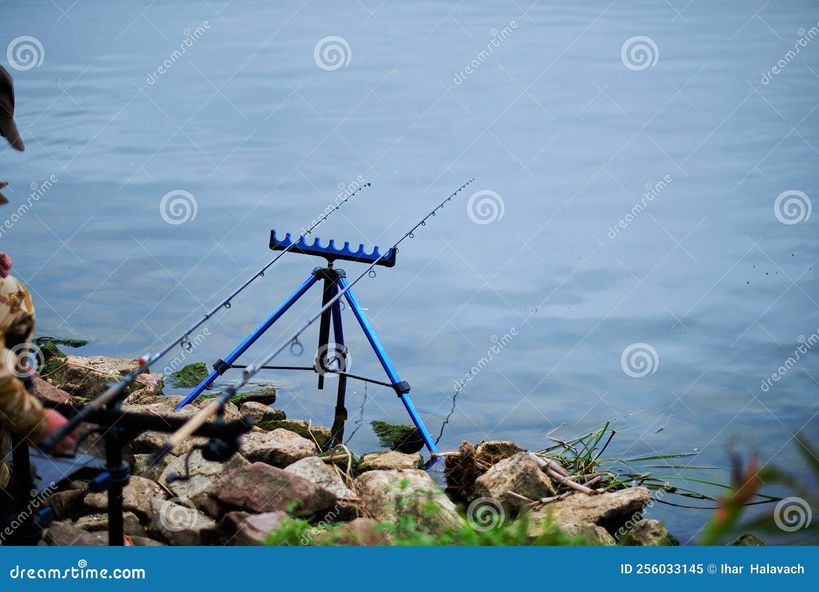 Fishing Rod on a Stand on the River Bank while Fishing Stock Image ...