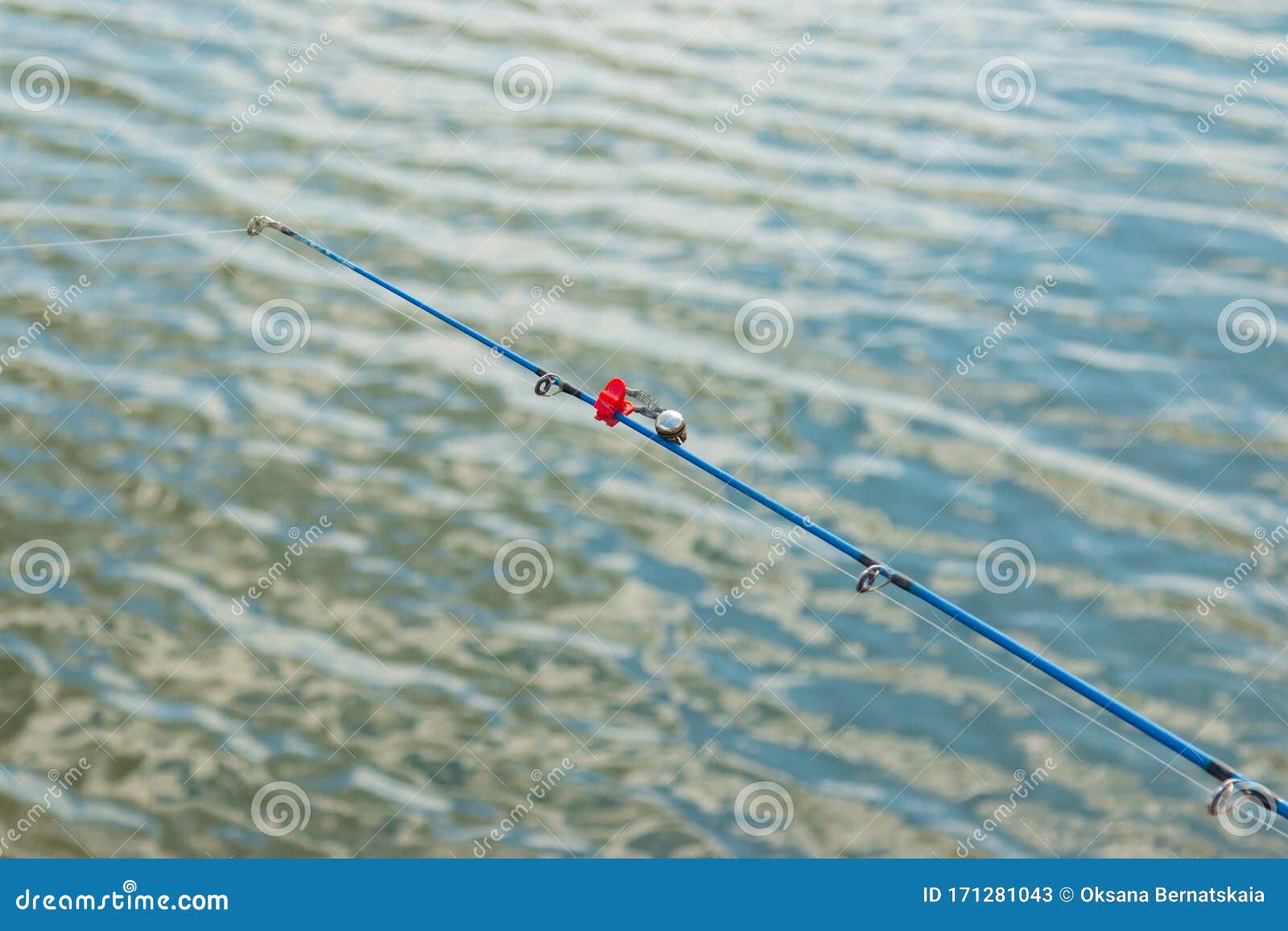 Fishing rod in the water stock image. Image of summer - 171281043