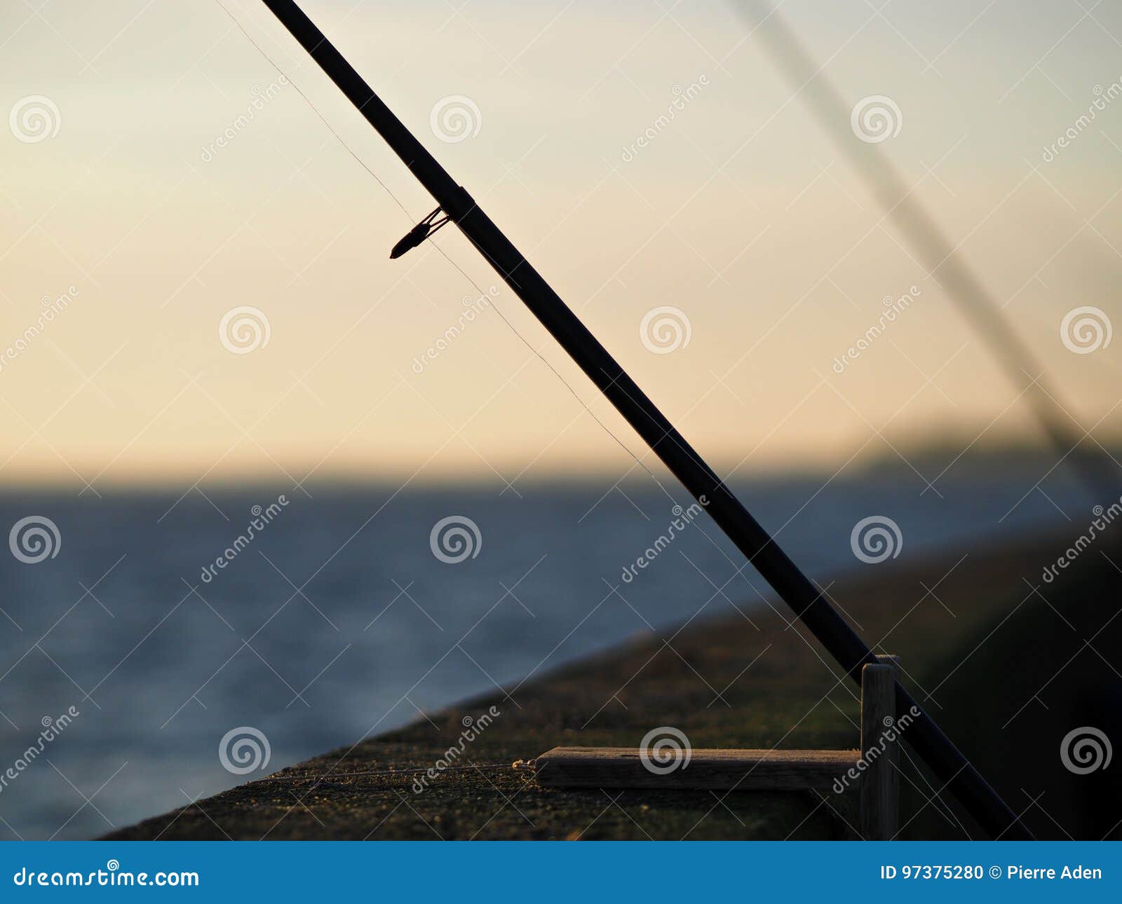Fishing Rod in Wilhelmshaven Stock Photo - Image of hobbies, swell ...