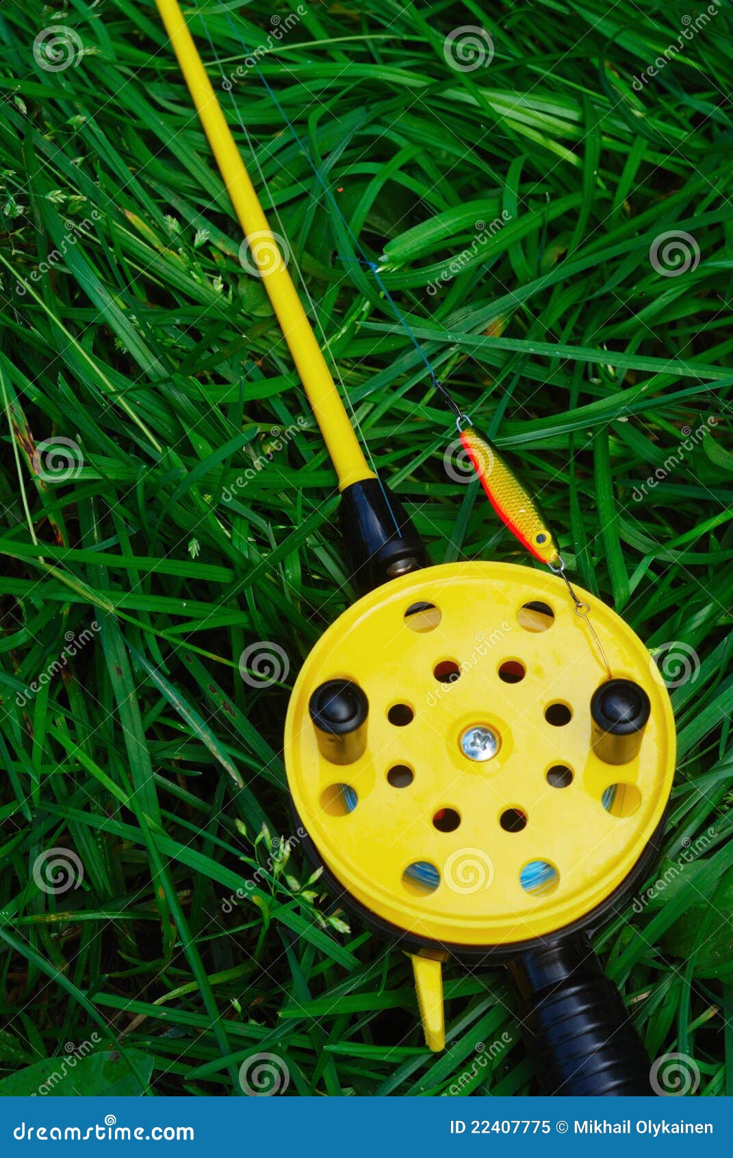 Fishing Rod with Yellow Reel Stock Image - Image of angling, grass ...