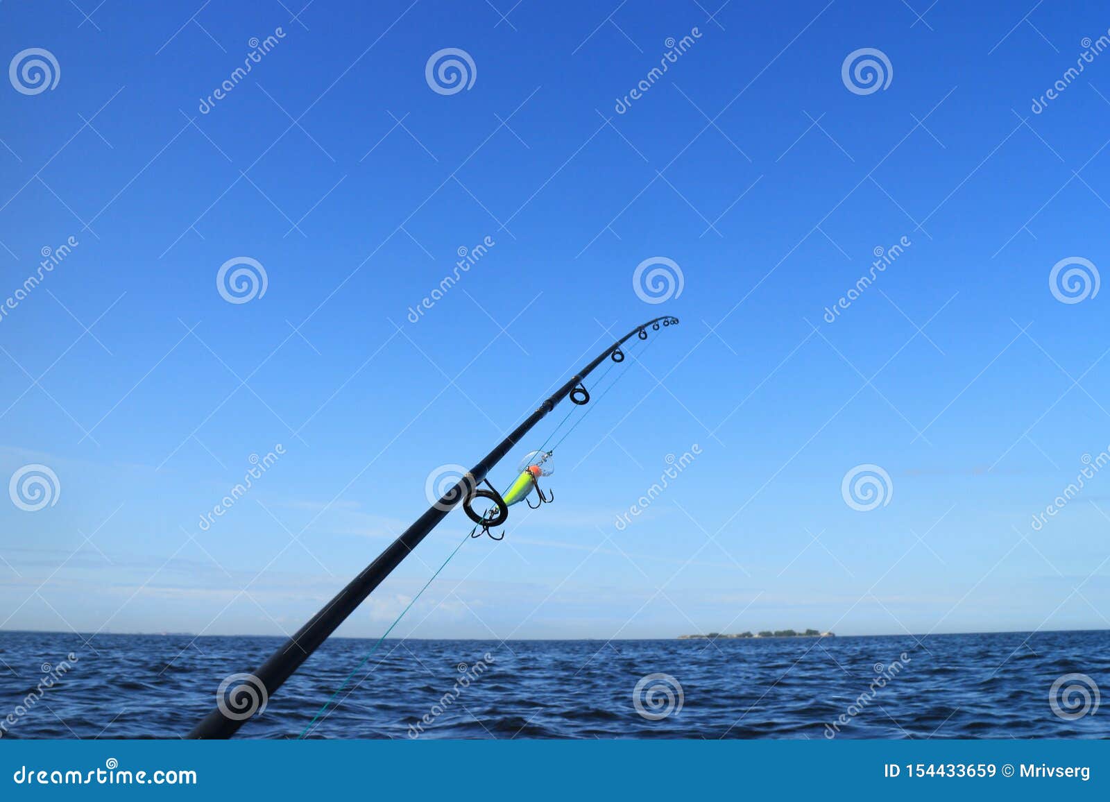 Fishing on the sea stock image. Image of fish, stretching - 154433659