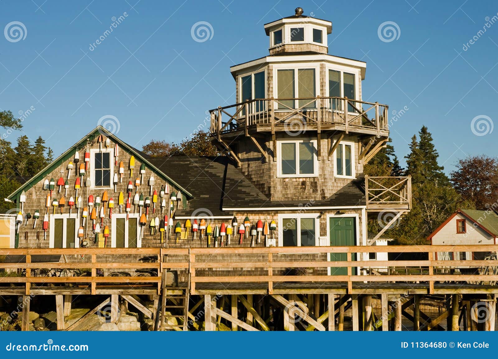 Fishing shack and pier stock photo. Image of buoys, house - 11364680