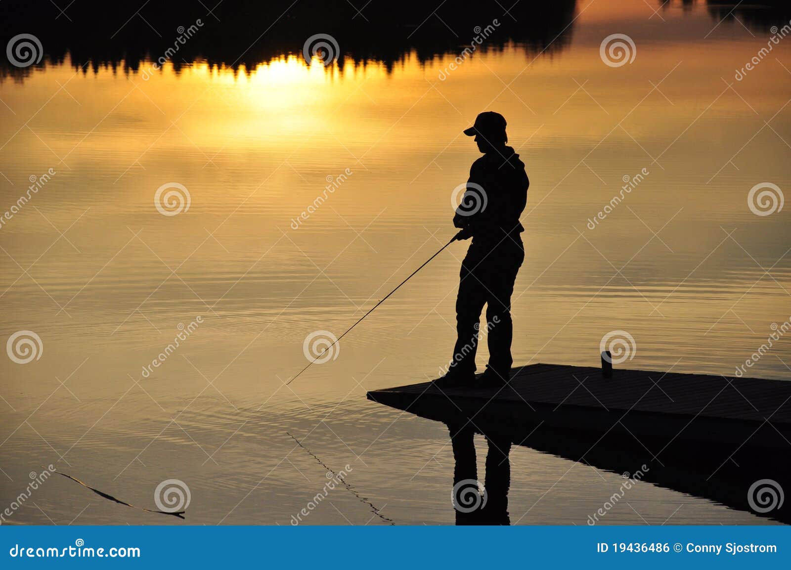 Fishing at sunset stock photo. Image of golden, contour - 19436486