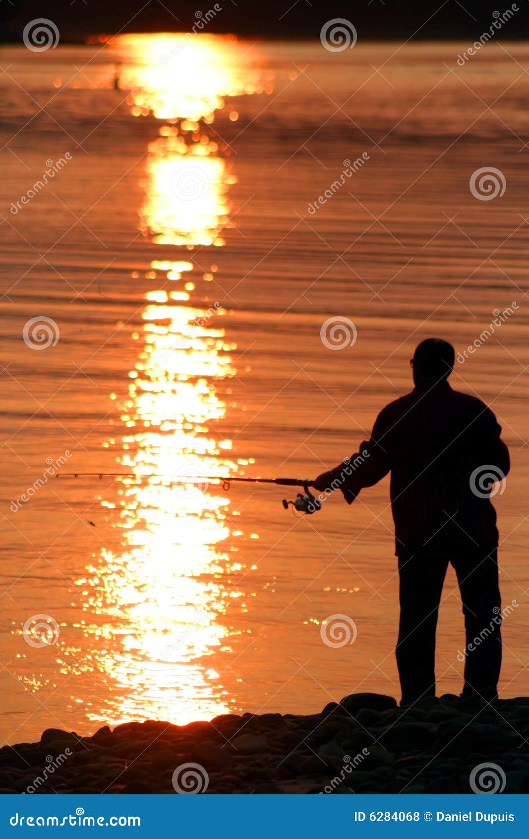 Fishing at Sunset stock photo. Image of orange, line, outdoors - 6284068