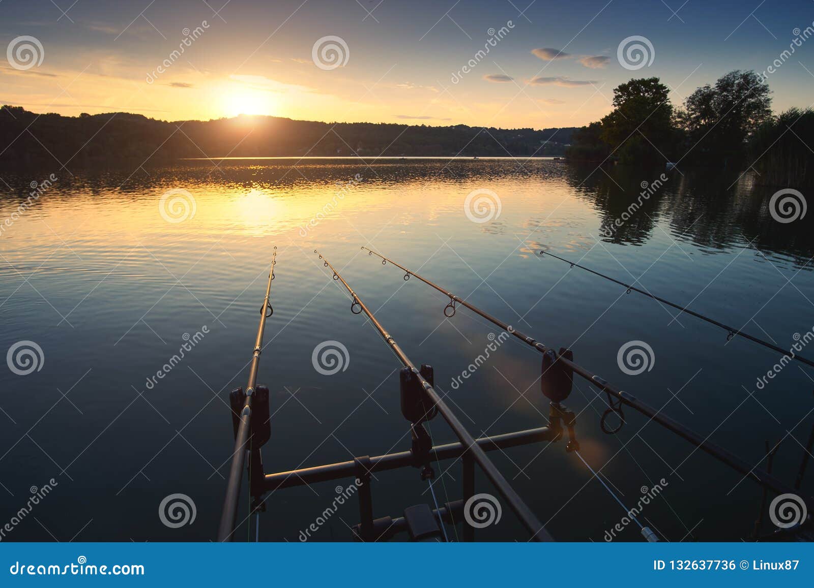 Fishing at sunset stock photo. Image of outdoor, relaxation - 132637736