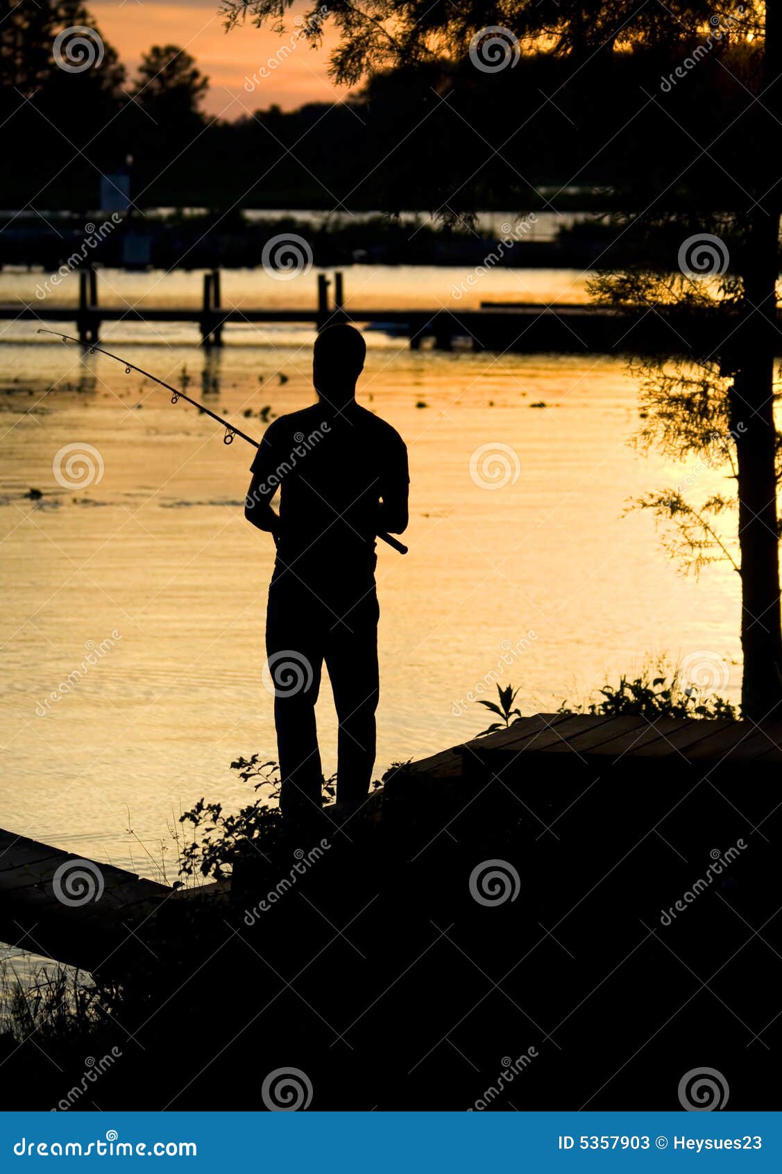 Fishing Sunset Silhouette Picture. Image: 5357903