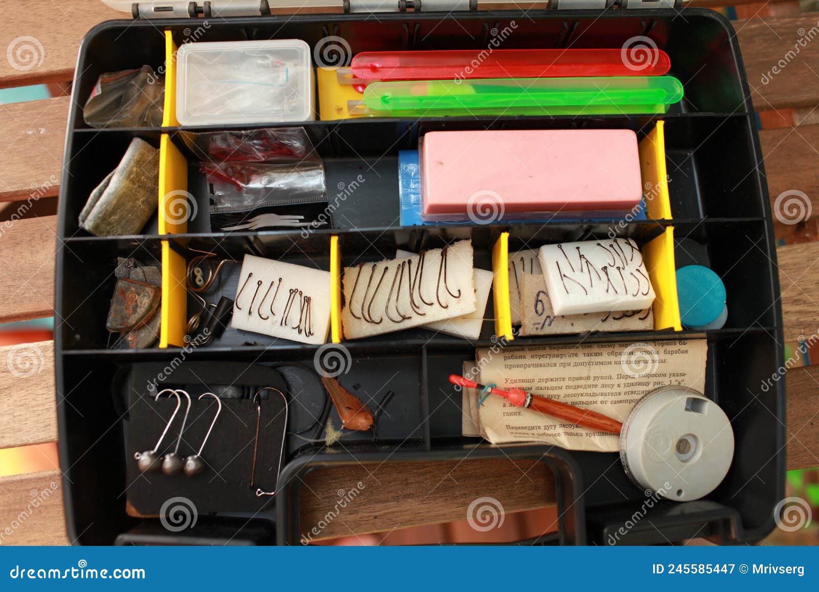 Fishing tackle box inside stock image. Image of fishhook - 245585447