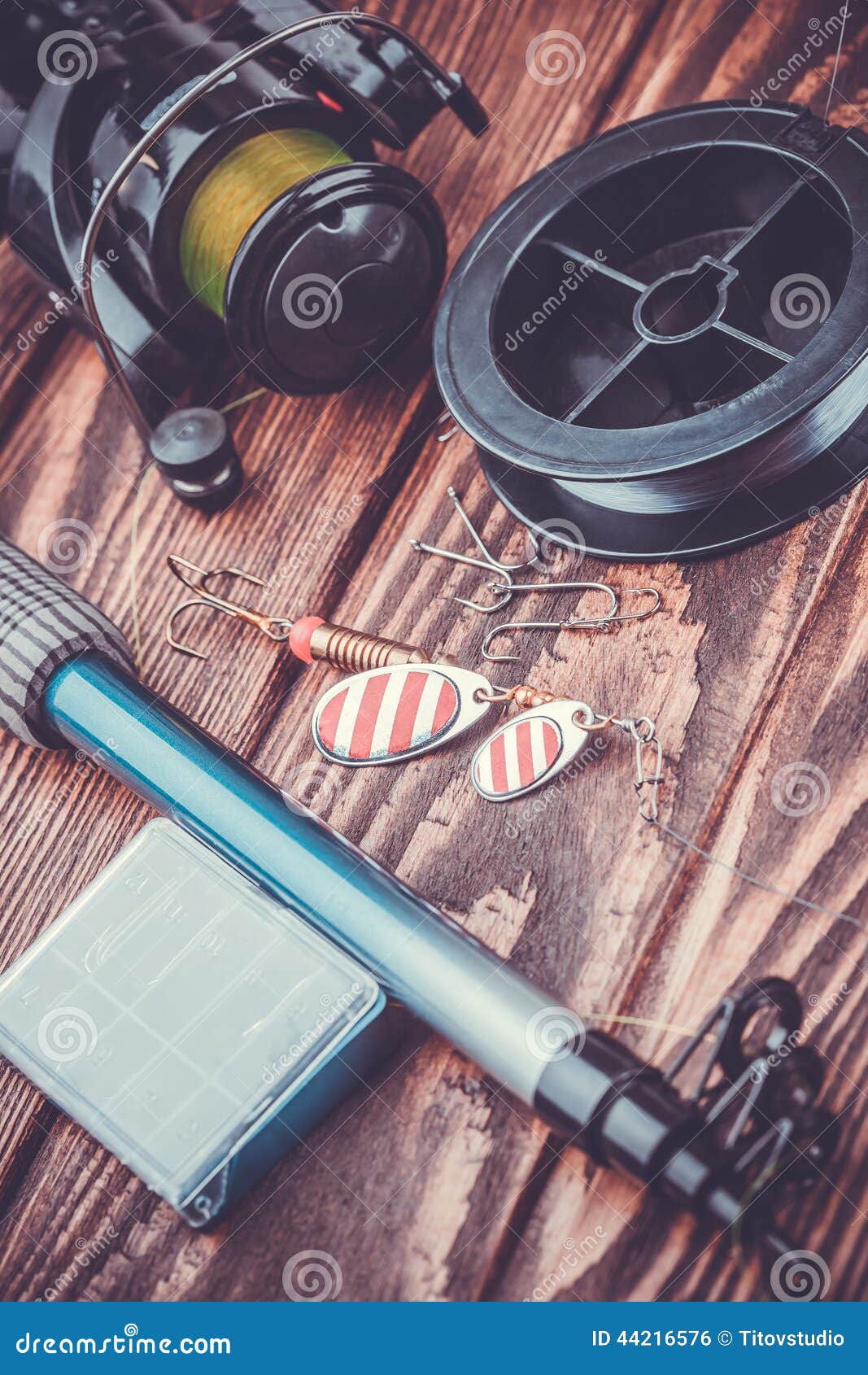 Fishing Tackle on a Wooden Table Stock Photo - Image of reel, fishing ...