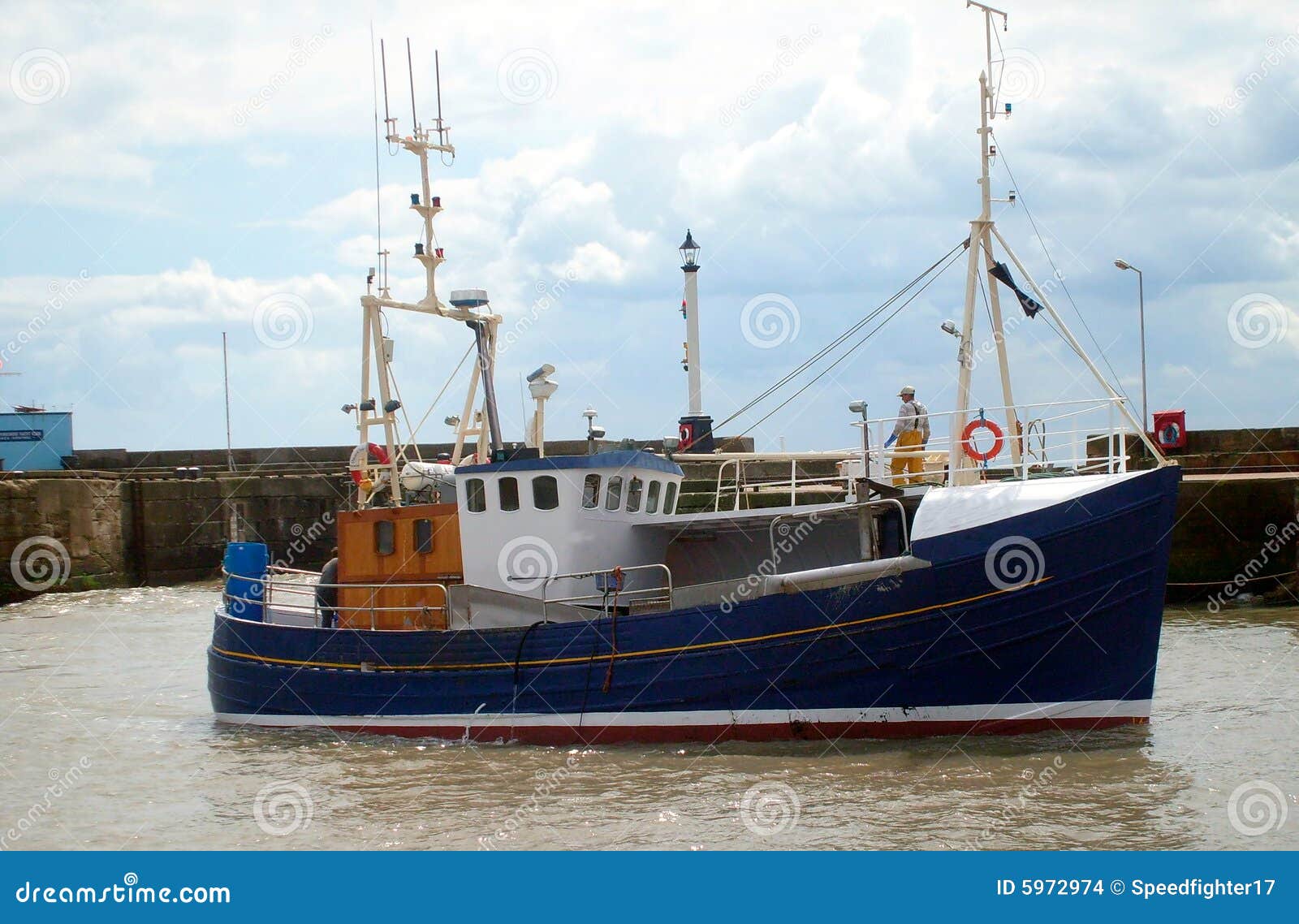 Fishing trawler in harbor stock photo. Image of sailing - 5972974