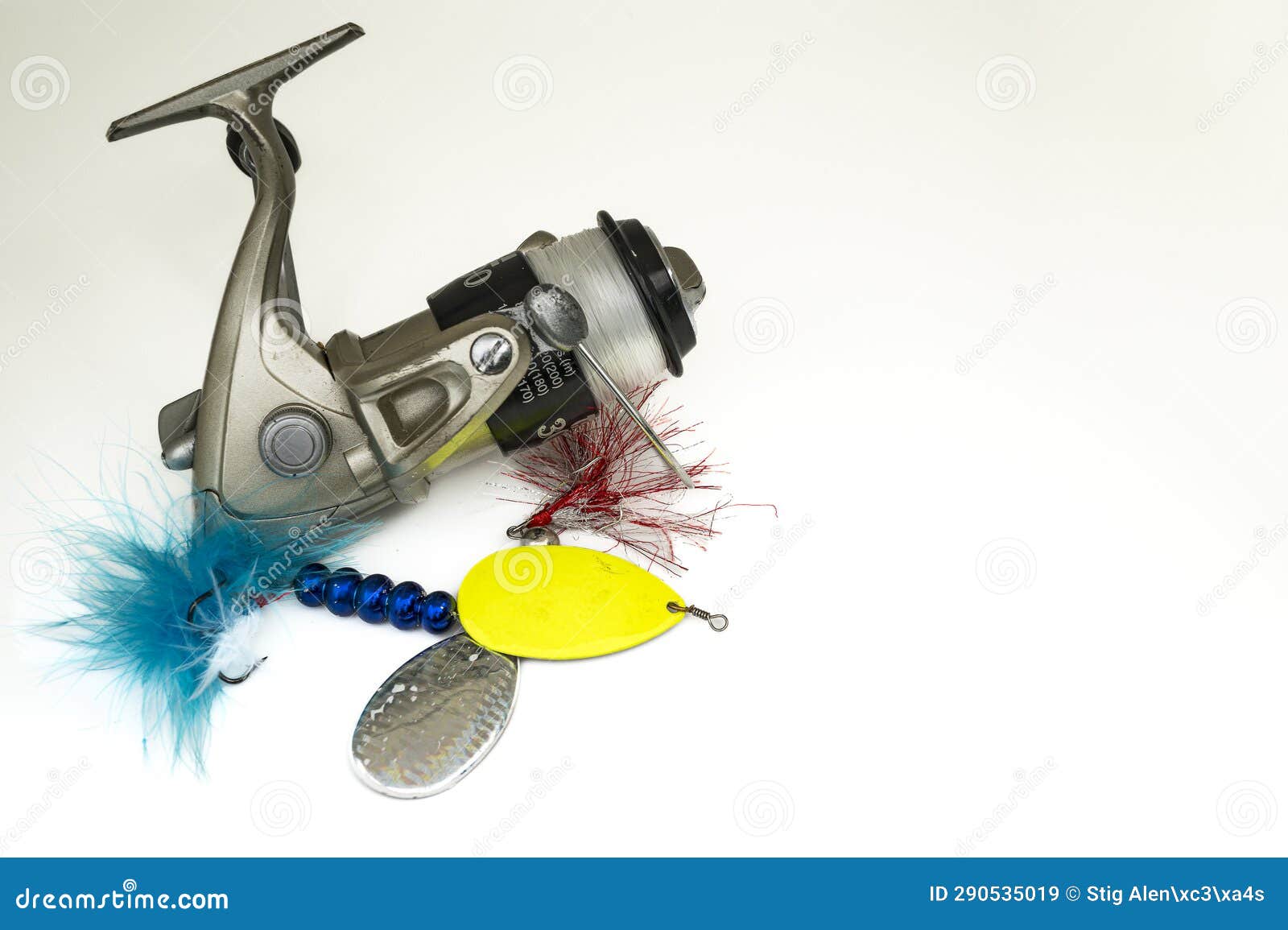 Fishing Wheel with Two Lures Isolated on White Stock Image - Image of ...