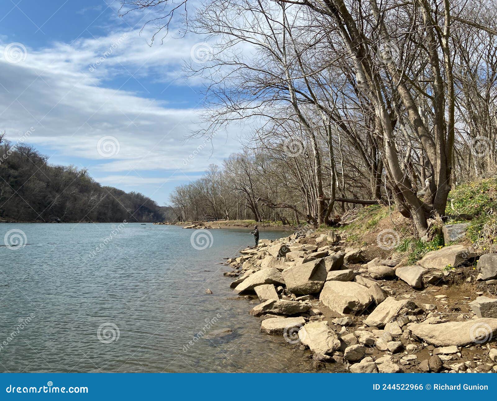 Fishing on a Windy Day in March Stock Photo - Image of potomac, trees ...