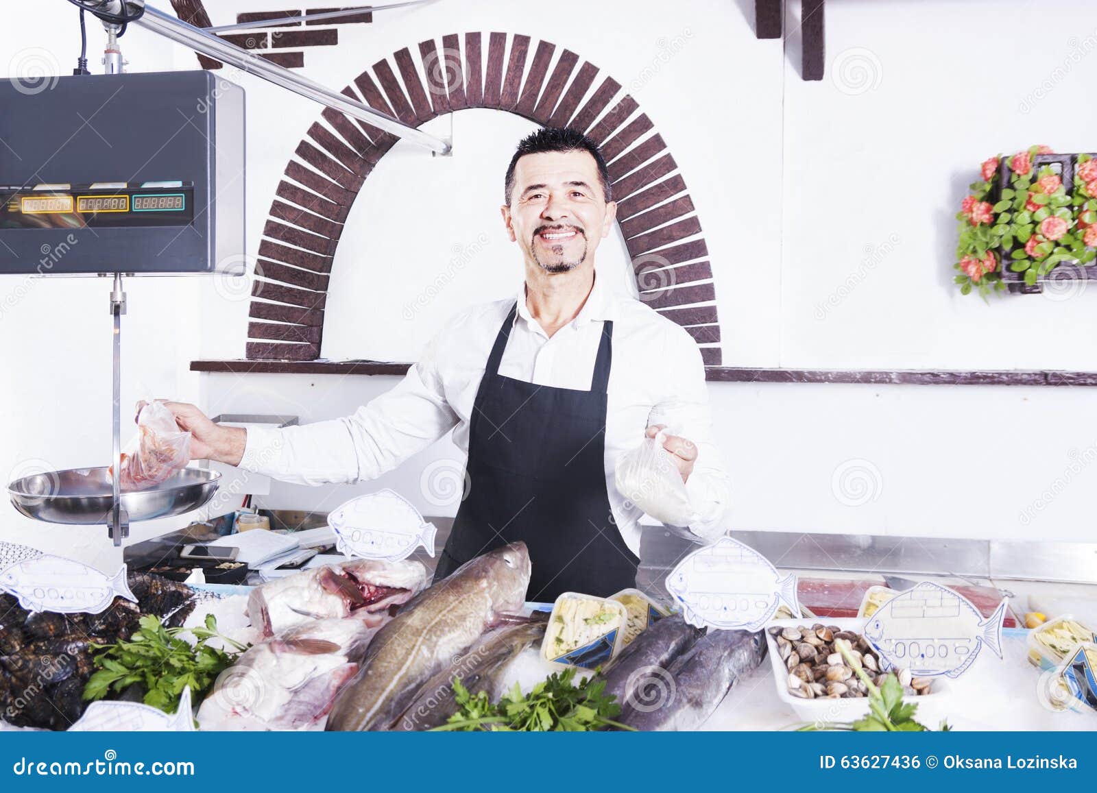 Fishmonger stock photo. Image of overfishing, retail - 63627436