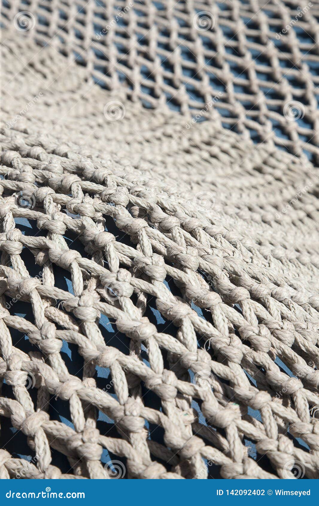 Fishnets drying on a boat stock photo. Image of patern - 142092402