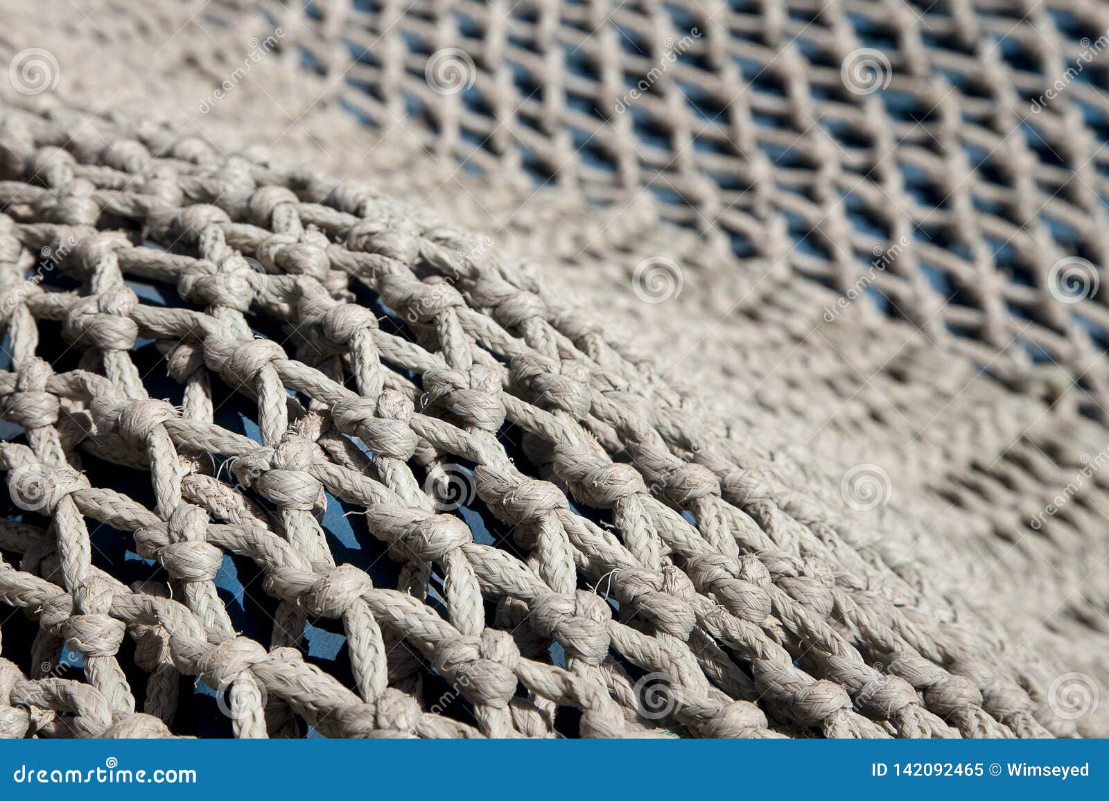 Fishnets drying on a boat stock image. Image of ocean - 142092465