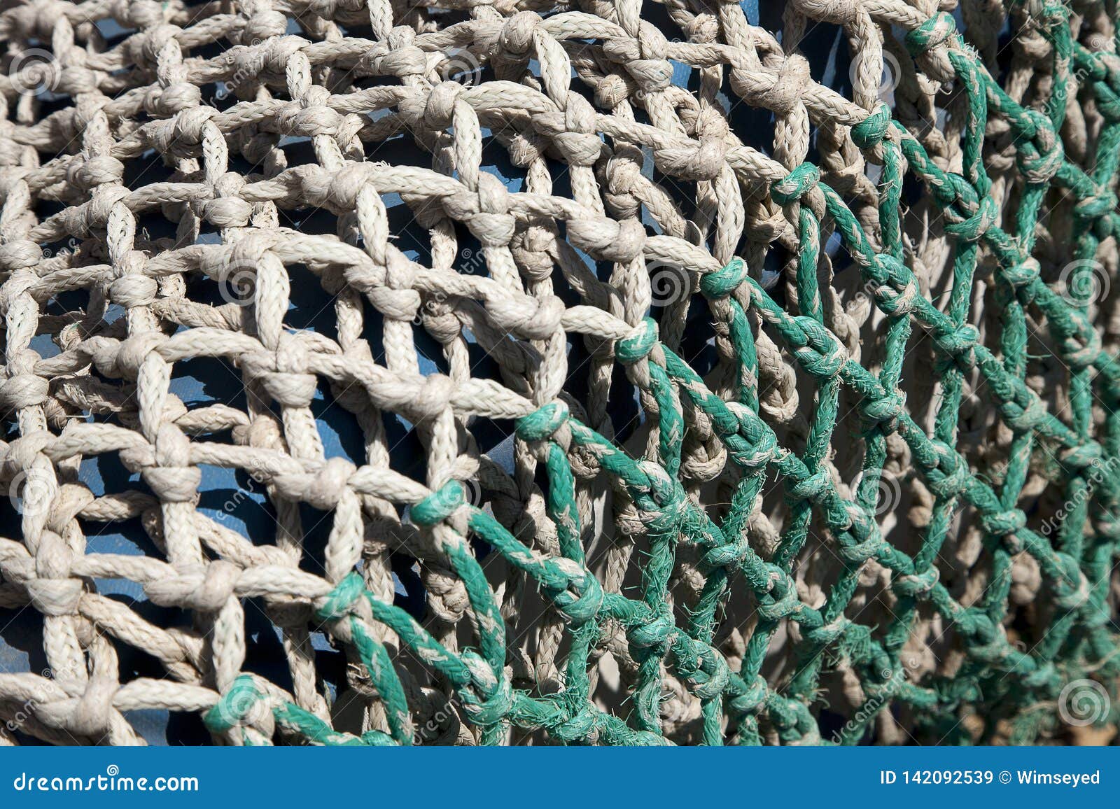 Fishnets drying on a boat stock image. Image of knots - 142092539