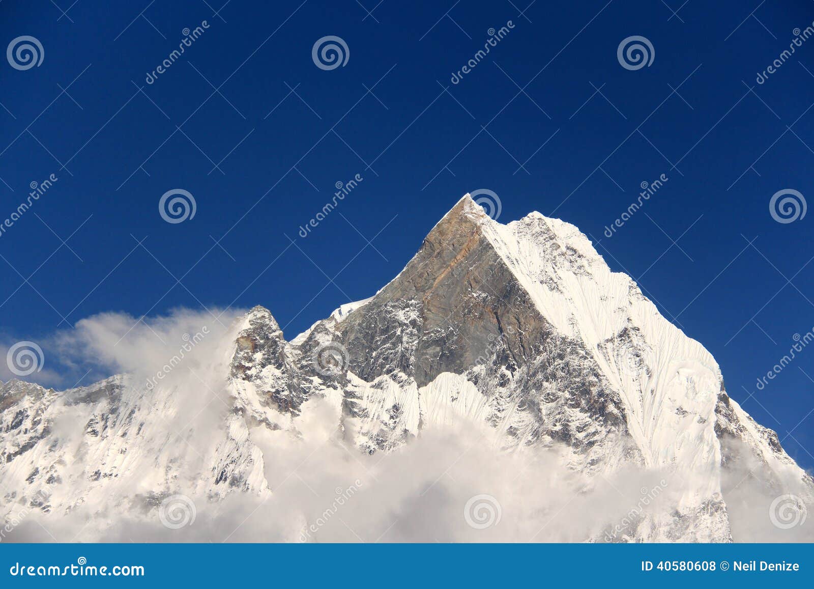 Fishtail Peak Just Above the Clouds Stock Photo - Image of fishtail ...