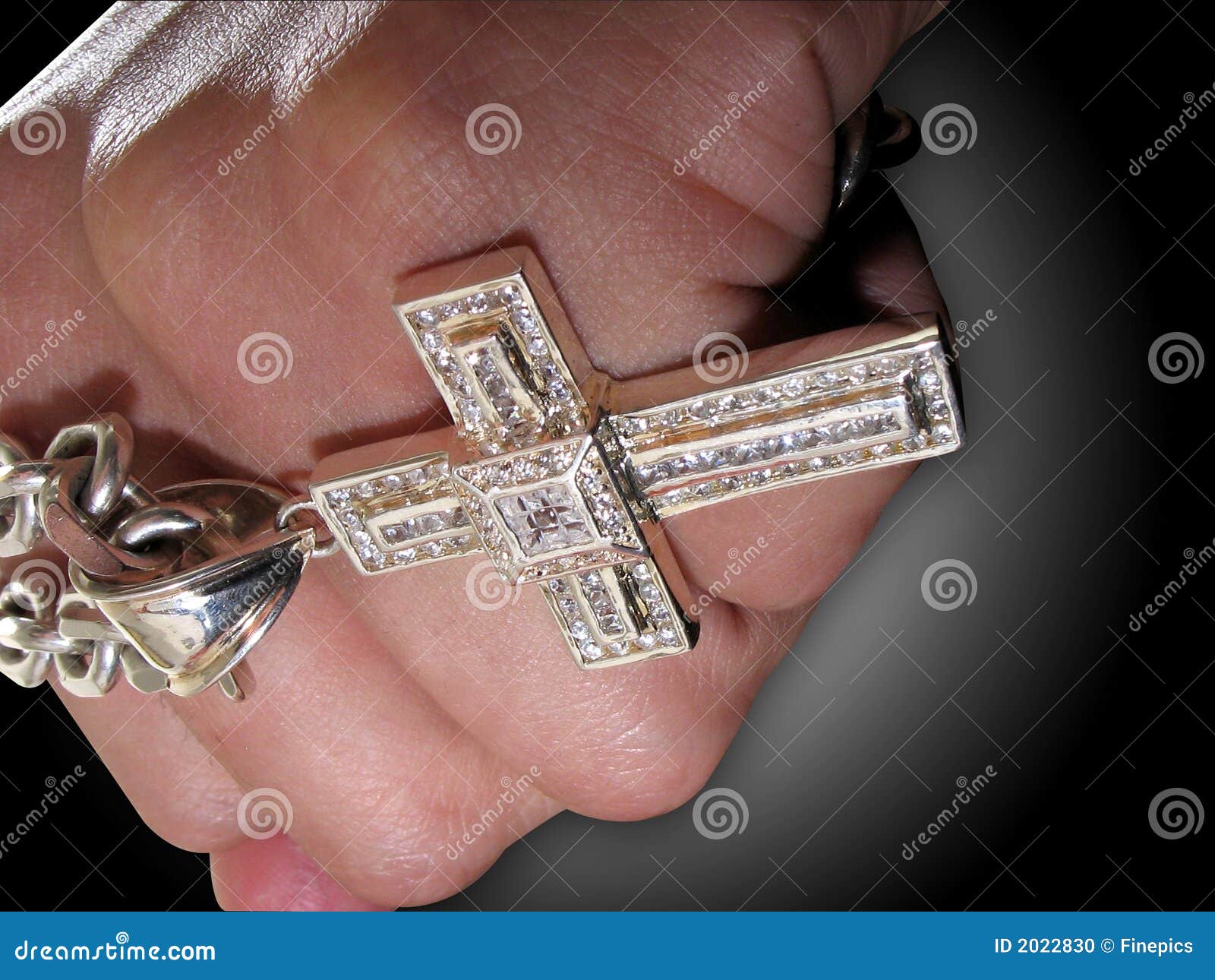Fist and the Bling Cross stock photo. Image of cash, money - 2022830