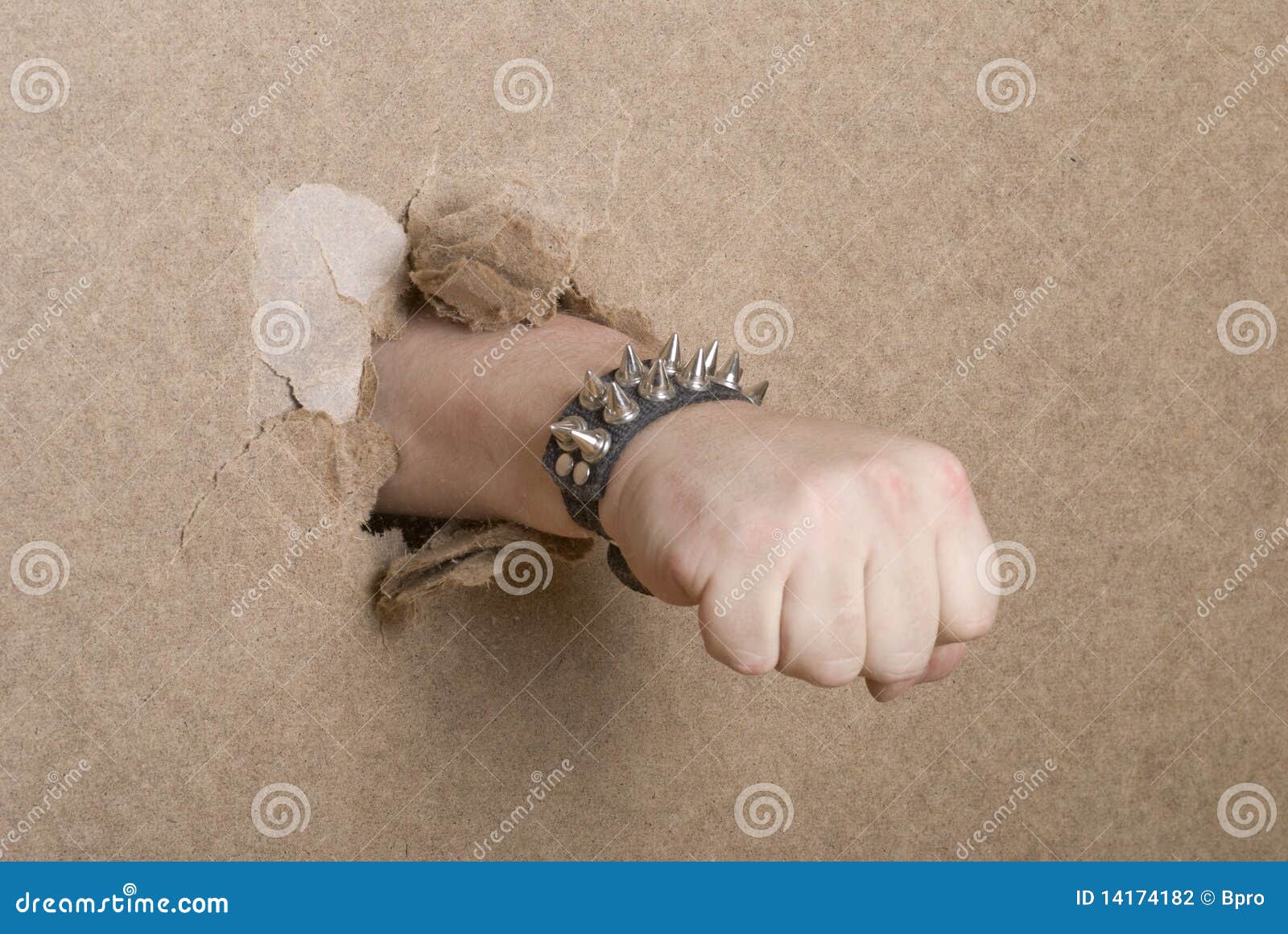 Fist Breaking through Cardboard Stock Photo - Image of destroy, break ...